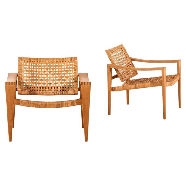 Pair Of Easy Chairs In Oak, Woven Cane, Brass And Leather By Hans ...