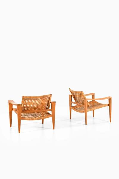 Pair Of Easy Chairs In Oak, Woven Cane, Brass And Leather By Hans ...